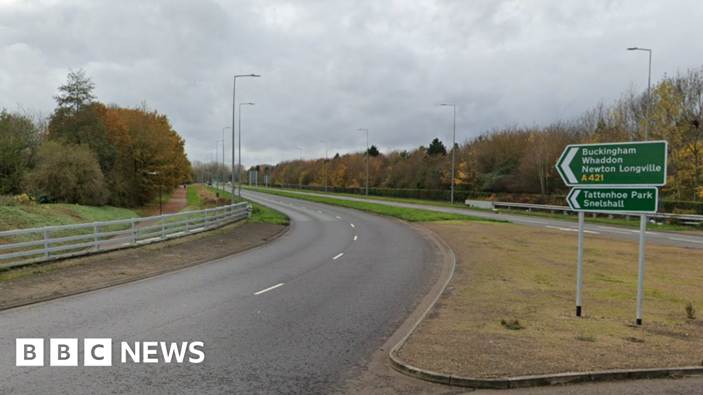 Milton Keynes car crash at roundabout leaves man seriously hurt - BBC News