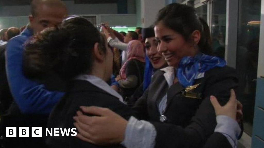 Hijacked plane crew and passengers return to Cairo - BBC News
