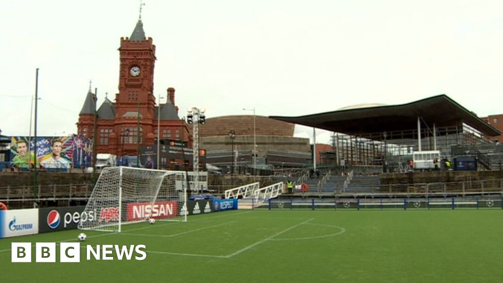 Floating pitch unveiled for Champions League festival - BBC News