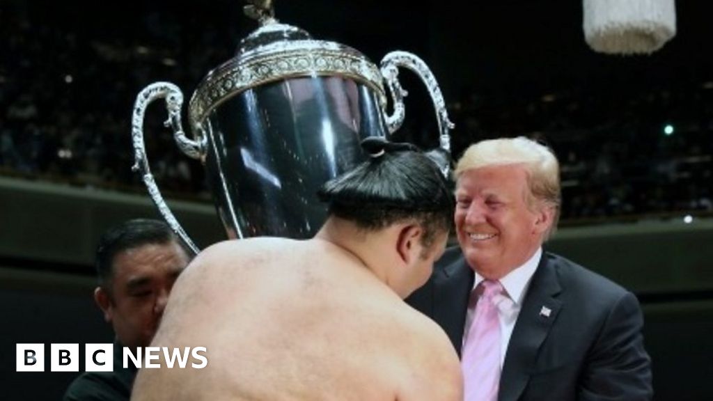 Trump awards 'President's Cup' at sumo match in Japan - BBC News