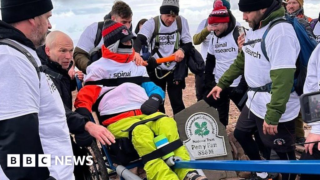 Pen y Fan: Watch paralysed Jon Hobbs reach top of mountain