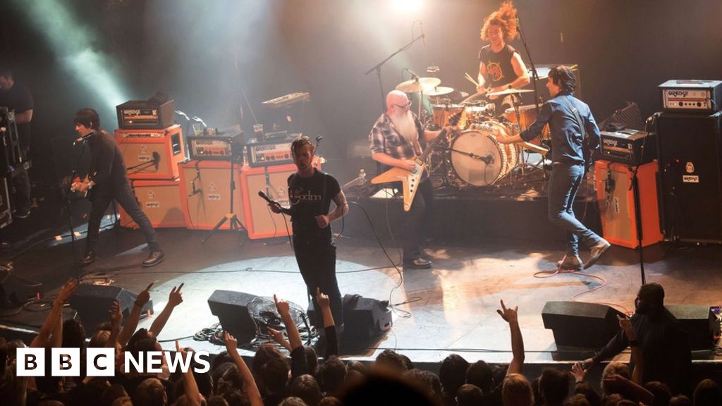 Eagles of Death Metal drummer says band will finish Paris gig - BBC News