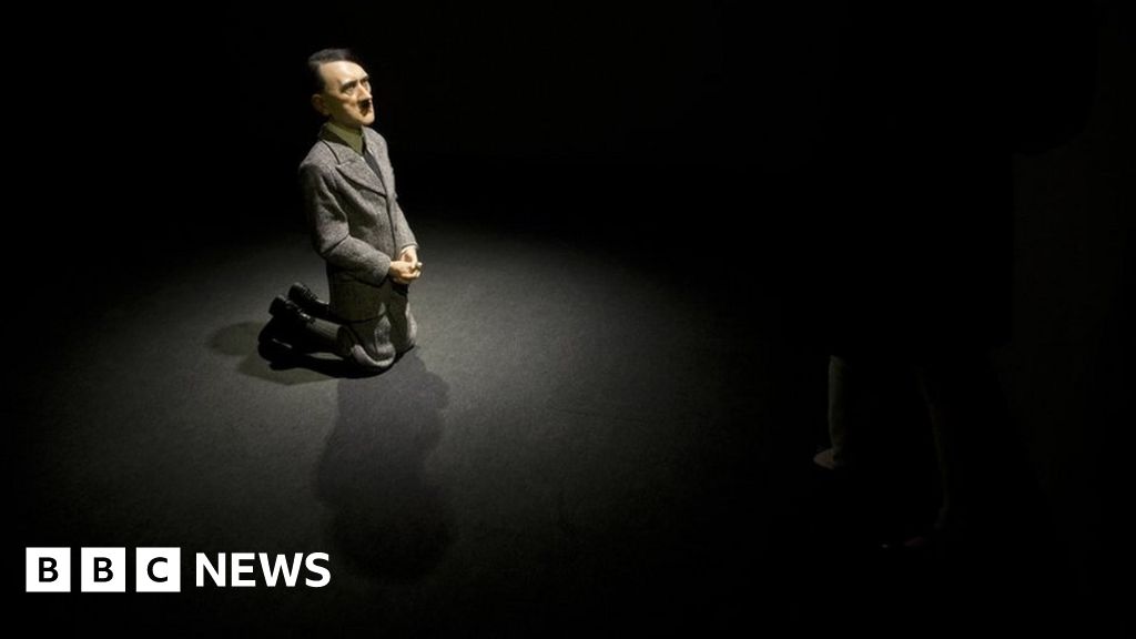 Kneeling Hitler sells for £11.9m in New York auction - BBC News