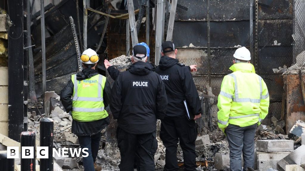 Body found in wreckage of burned-out store in Perth