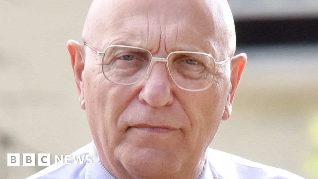 Bob Higgins trial: Abuse accused was 'in bed with wife'