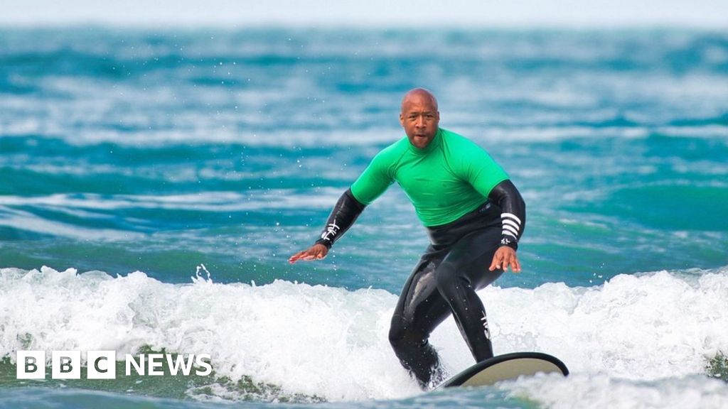Surfing provides therapy for front line workers - BBC News