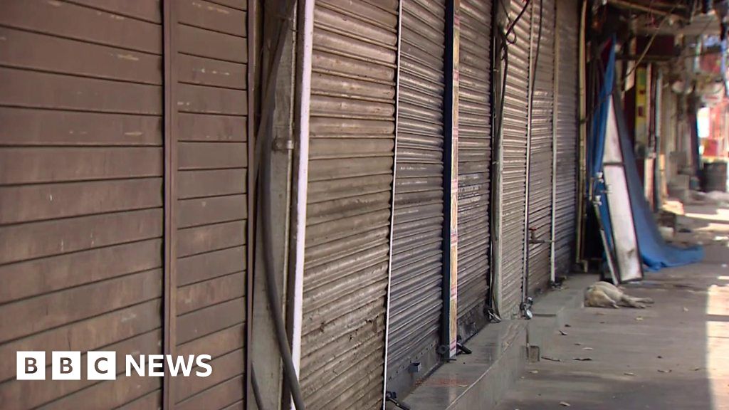 Coronavirus: First day of lockdown in India - BBC News