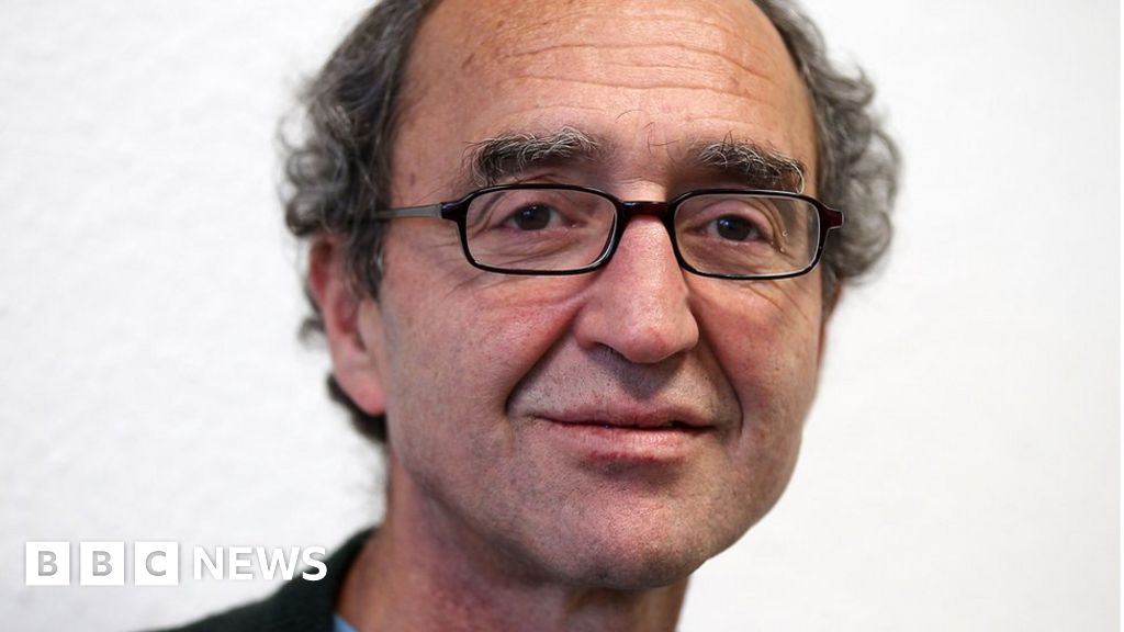 Dogan Akhanli: Spain grants Erdogan critic conditional release - BBC News