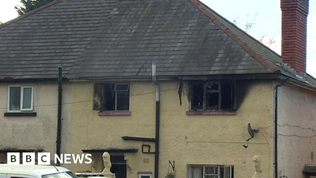 Three in hospital and pet killed in Cardiff house fire - BBC News