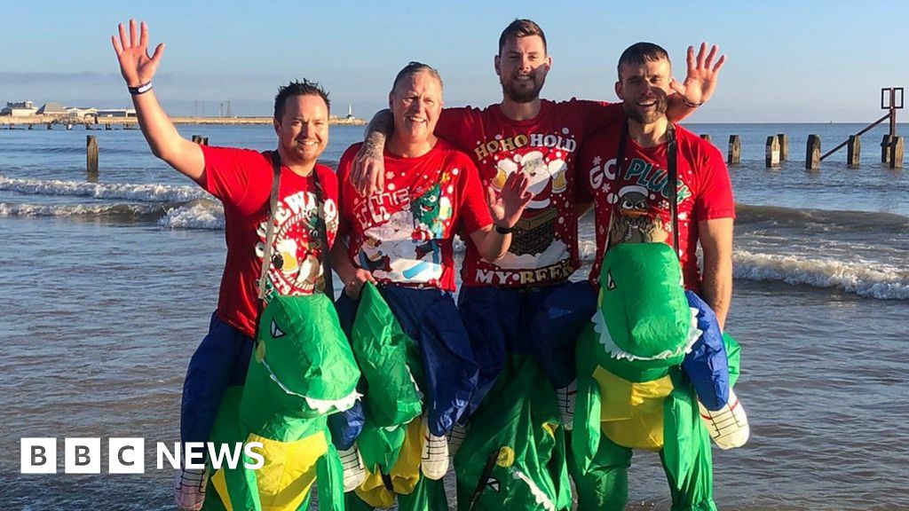 Festive East Coast dippers raise thousands for good causes - BBC News