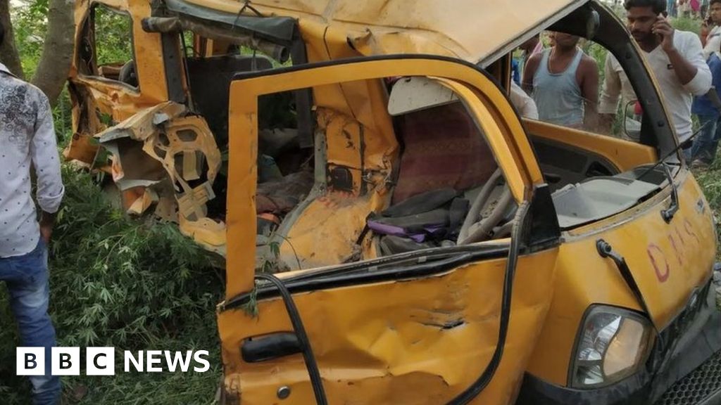 Thirteen children die as India school bus hits train - BBC News