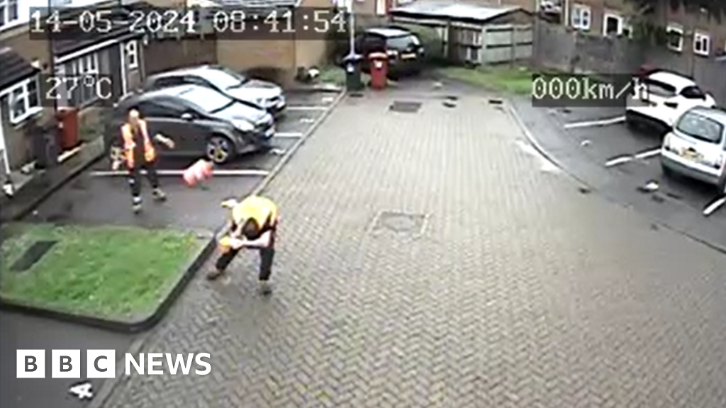 Slough: Exploding canister nearly hits refuse workers - BBC News