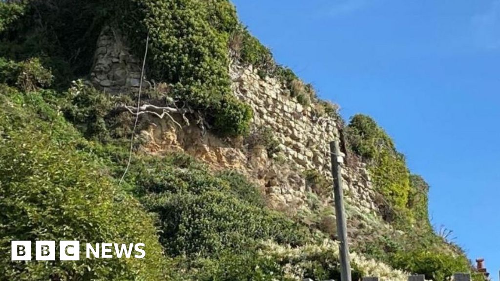 Plans to demolish 'perilous' Isle of Wight cliff wall - BBC News