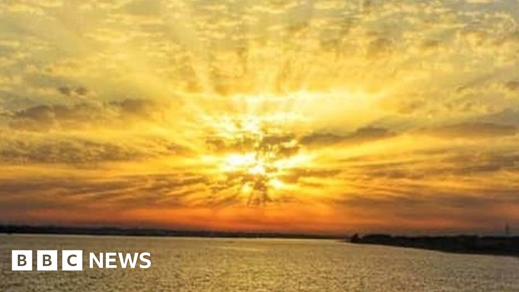 Crepuscular rays: Stunning sunsets light up the skies in the UK