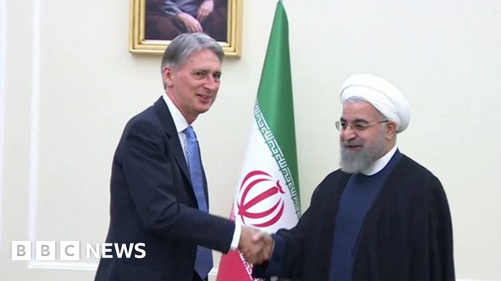 Hammond visits Tehran as UK reopens embassy in Iran - BBC News