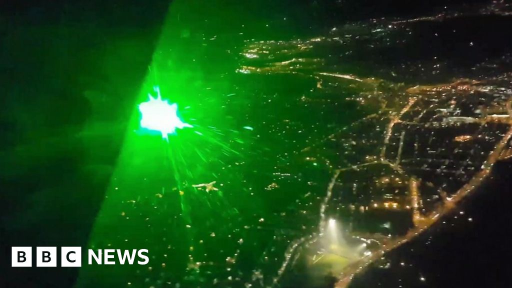 Laser light 'blinds' air ambulance doctor over Swansea Bay - BBC News