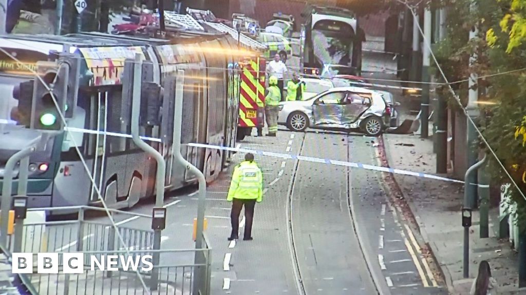 Nottingham tram track crash sees man taken to hospital - BBC News