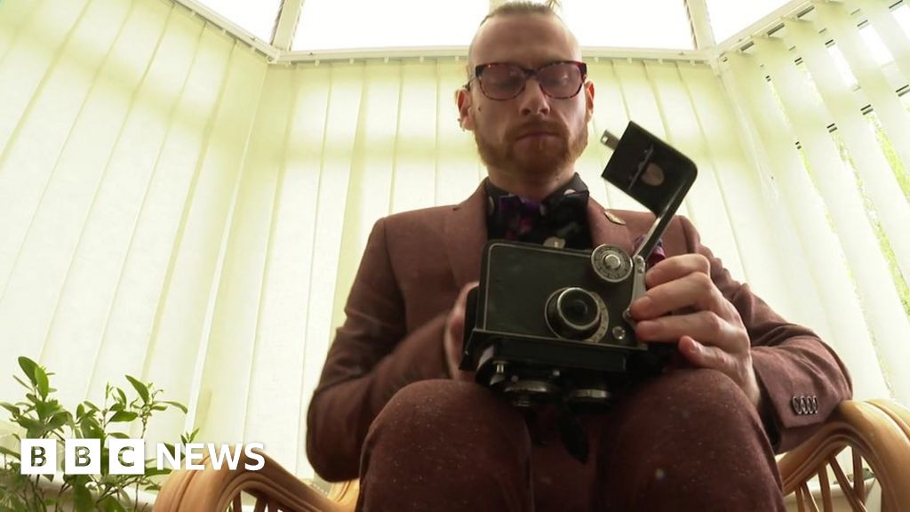 Autistic and deaf man gains photography award - BBC News