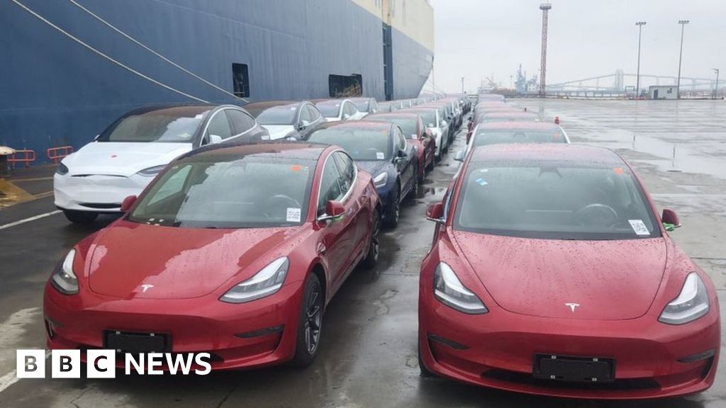 Tesla shares sink as car deliveries drop - BBC News