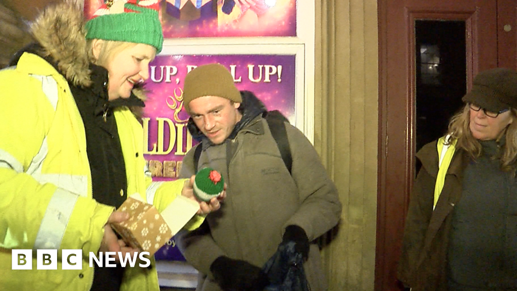 Volunteers hand out presents to homeless on Newcastle streets