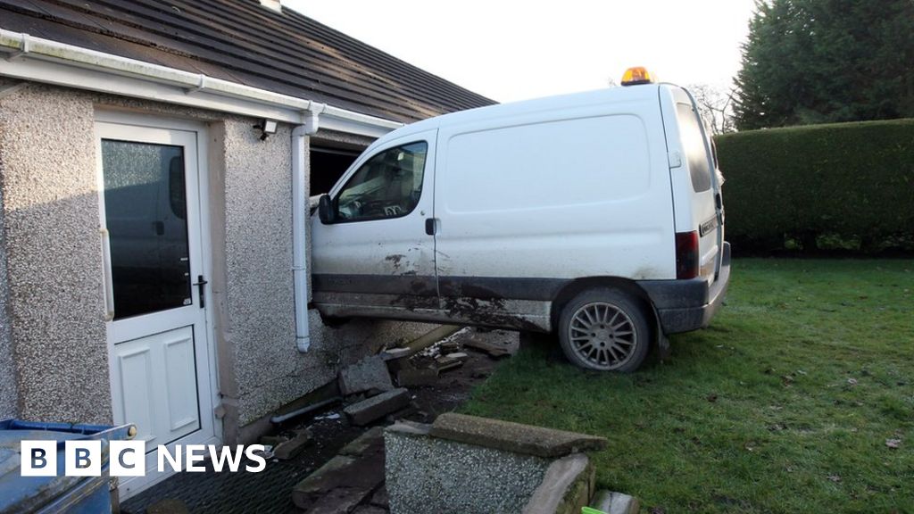Waringstown: Woman injured as van crashes into kitchen - BBC News