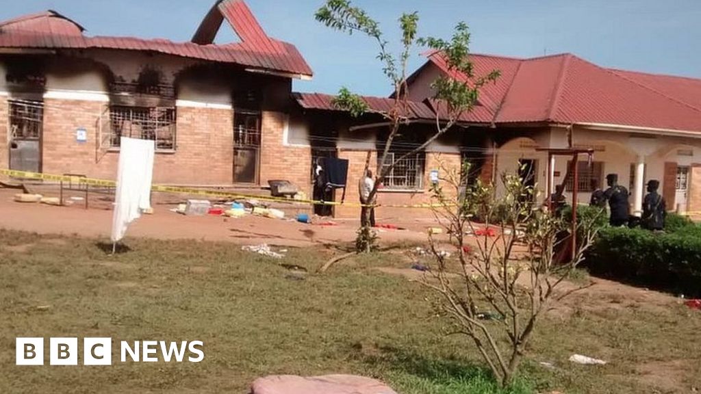 Uganda school fire: Three in custody after nine die in dormitory - BBC News