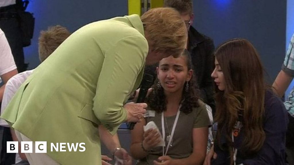 German chancellor criticised over crying refugee girl - BBC News