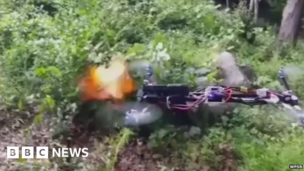 Footage of handgun drone - BBC News