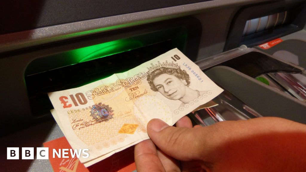 Banks 'working hard' to keep cash machines free - BBC News