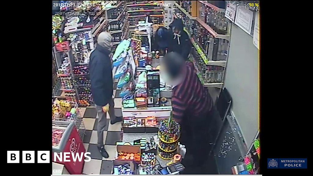 Moment shopkeeper fights off armed robber in Twickenham