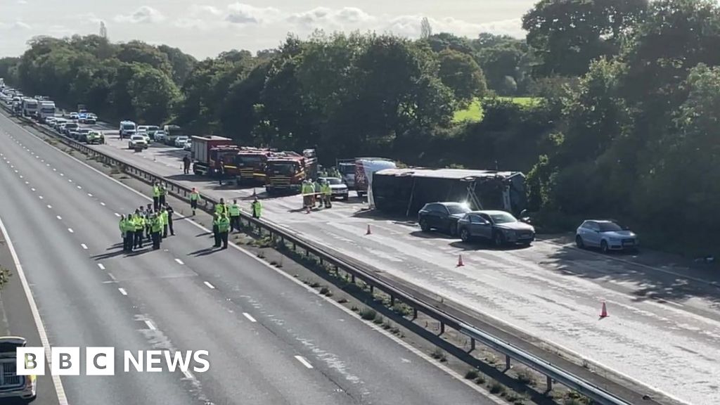 M53 crash: Major incident as school bus full of children overturns