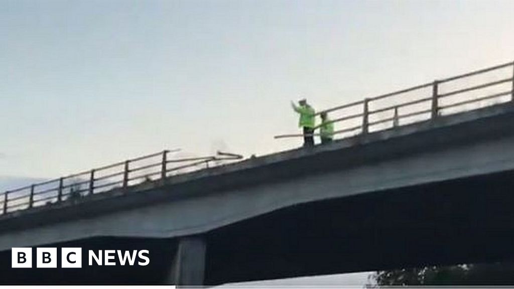 Police release footage of A11 car plunge scene in Suffolk - BBC News