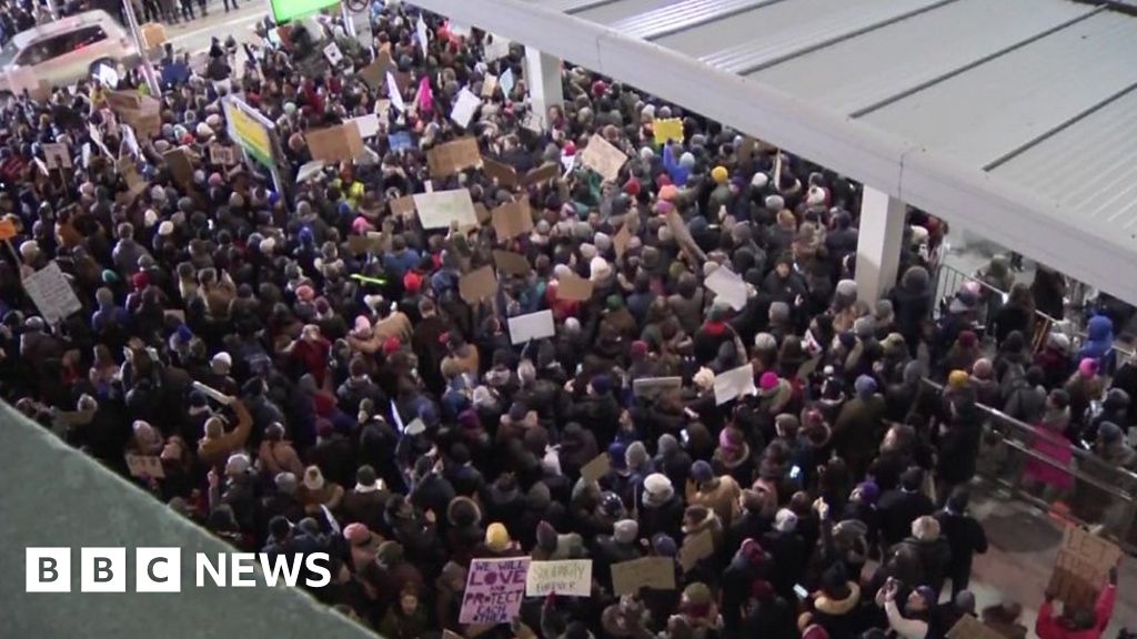 Trump executive order: Calls of 'let them in' at airport protests - BBC ...