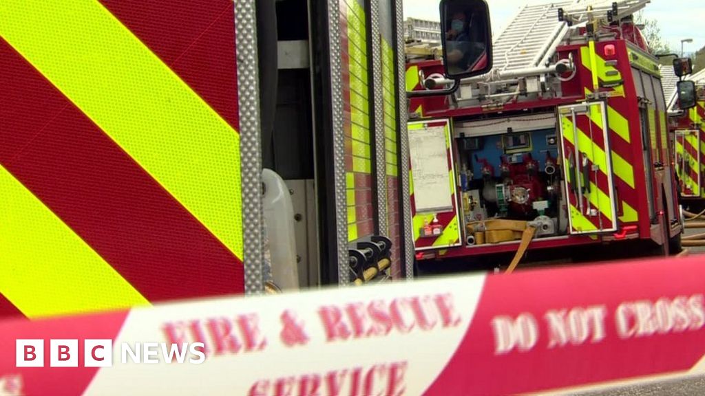 Woodvale Road: Belfast flats evacuated after pram set alight - BBC News