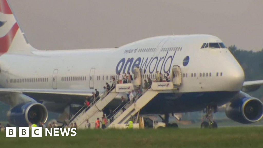 BA flight to London diverted to Montreal after 'alert' - BBC News