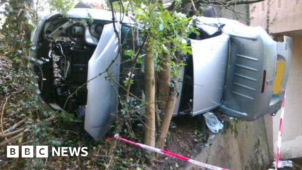 Three women escape serious injury after car ploughs off a bridge in ...
