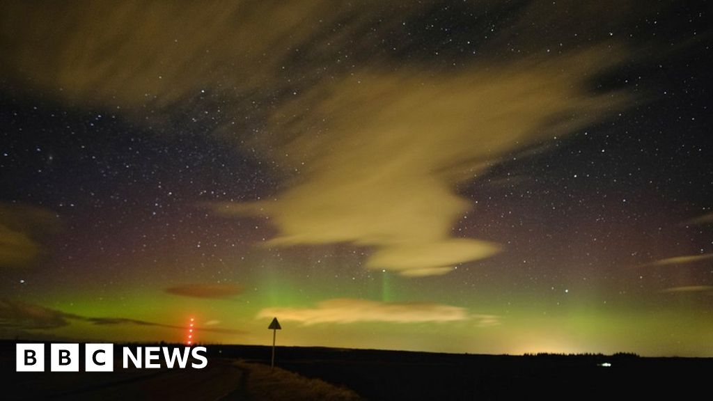 Aurora lights up the night sky over Scotland