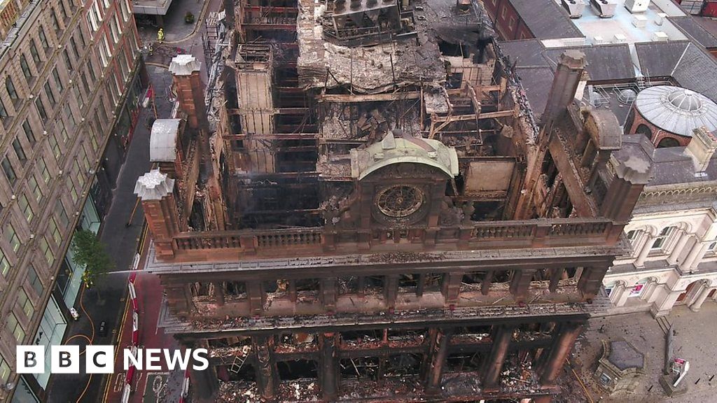 Belfast Primark fire: Drone footage shows Bank Buildings damage - BBC News