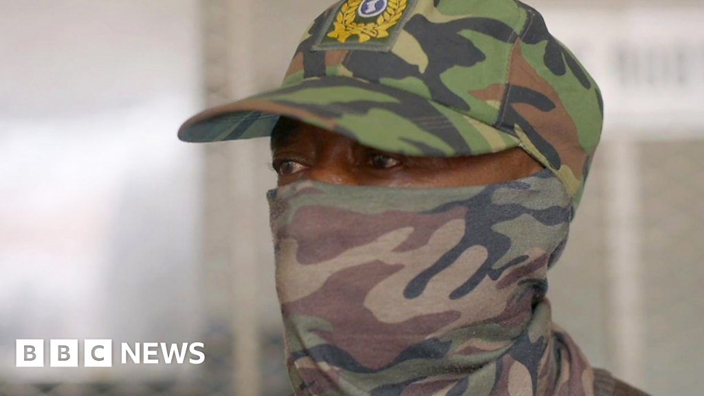 Operation Dudula operatives on a mission in Soweto - BBC News