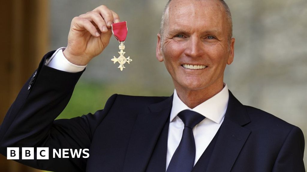 Ex-footballer Geoff Thomas receives MBE for charity work - BBC News