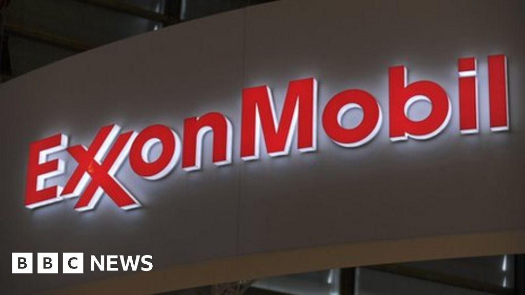 Exxon shareholders back 'historic' vote on climate - BBC News