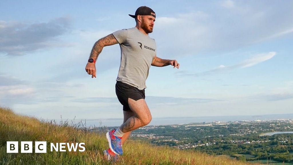 Ultra runner Rhys Jenkins beats Wales Coast Path record - BBC News