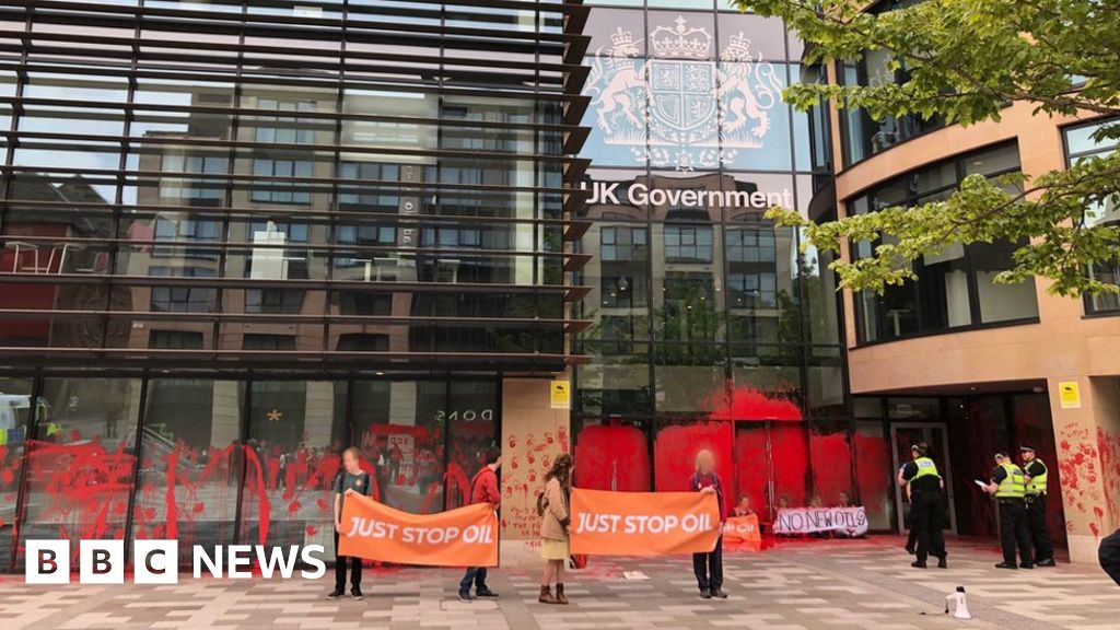 Paint thrown at UK government building in gas field protest - BBC News