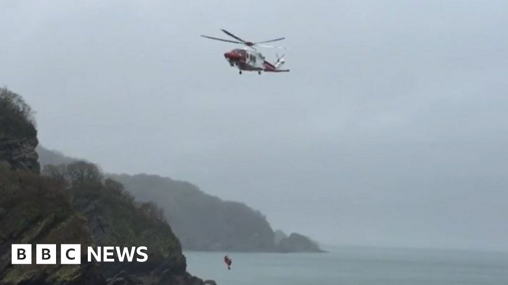 Helicopter rescue for boy stuck on Devon cliff - BBC News