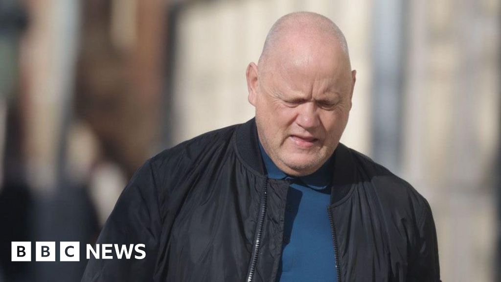 Belfast: Man acquitted over masked group's 'show of strength' - BBC News