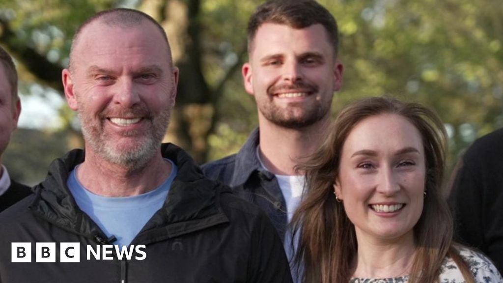 Runner reunited with doctors who saved him after street collapse - BBC News