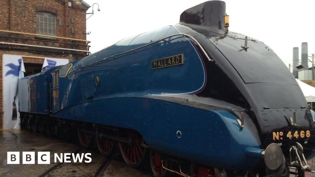 Ex-Mallard fireman reunited with record-breaking steam loco - BBC News