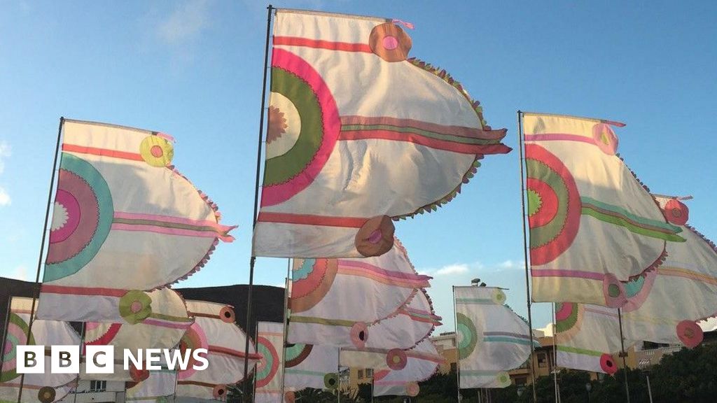 WOMAD: Artist celebrates 30 years of festival flags - BBC News