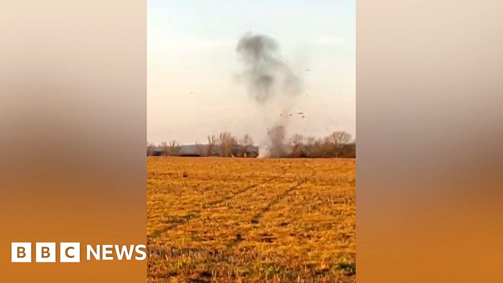 Watch: World War Two bomb detonated in Ely field - BBC News