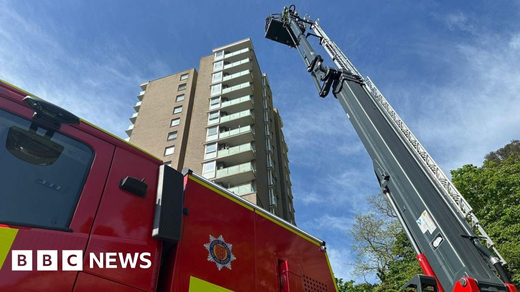 New aerial ladder put to the test by Jersey firefighters - BBC News